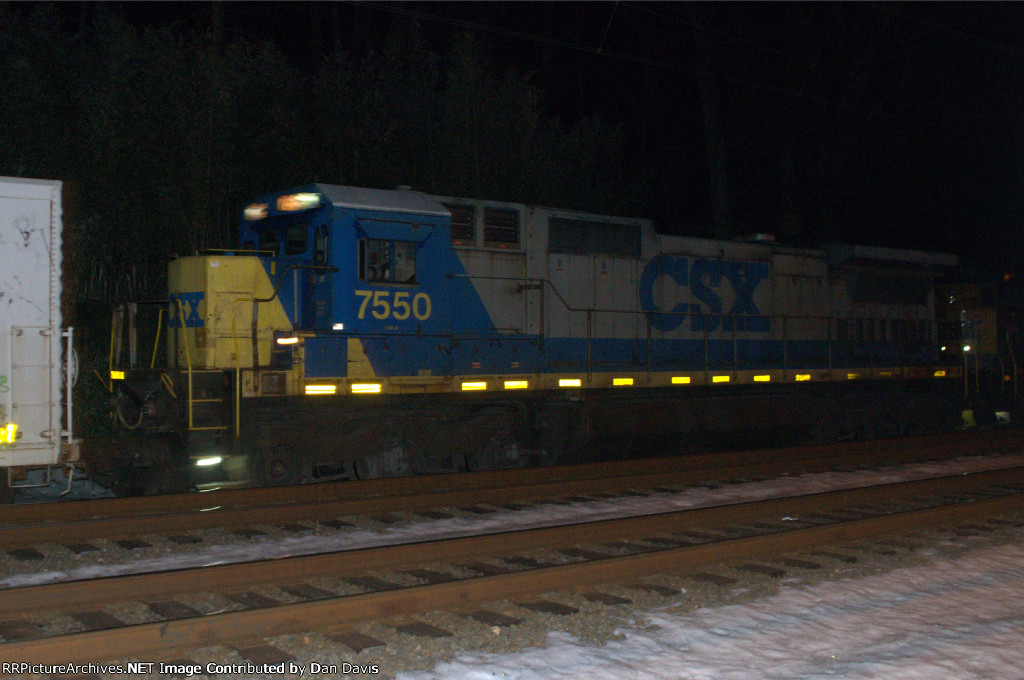 CSX C40-8 7550 trails an AC60CW on Q301-25